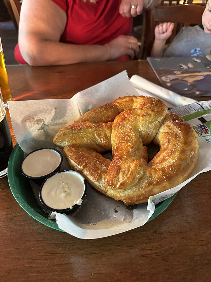 Behold the pretzel that launched a thousand road trips &ndash; golden, twisted perfection served with dipping sauces that make you question all other bread products.