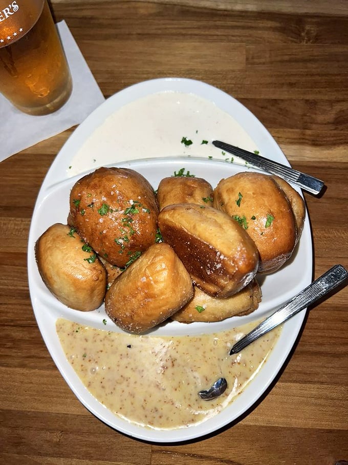 These Bavarian pretzels aren't just appetizers, they're an event - golden-brown ambassadors of joy served with beer cheese that could make a German weep with happiness.