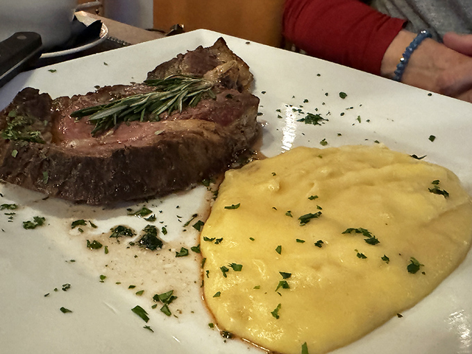 The prime rib that launched a thousand road trips. That rosemary sprig isn't garnish&mdash;it's a victory flag claiming steak supremacy.