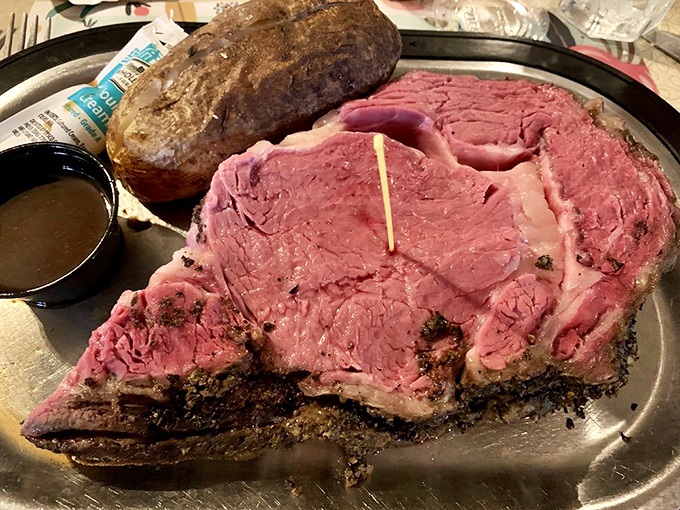 Behold the star of the show&mdash;prime rib so perfectly pink it practically glows, with a seasoned exterior that whispers of patience and tradition.