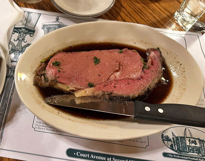 The prime rib arrives like a carnivore's dream&mdash;perfectly pink, swimming in savory jus. This isn't dinner; it's a religious experience with a knife and fork.