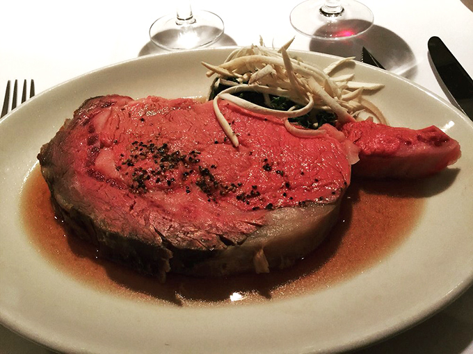 Behold the star of the show&mdash;rosy, succulent prime rib resting in its natural jus. This isn't just dinner; it's a carnivore's dream realized. 