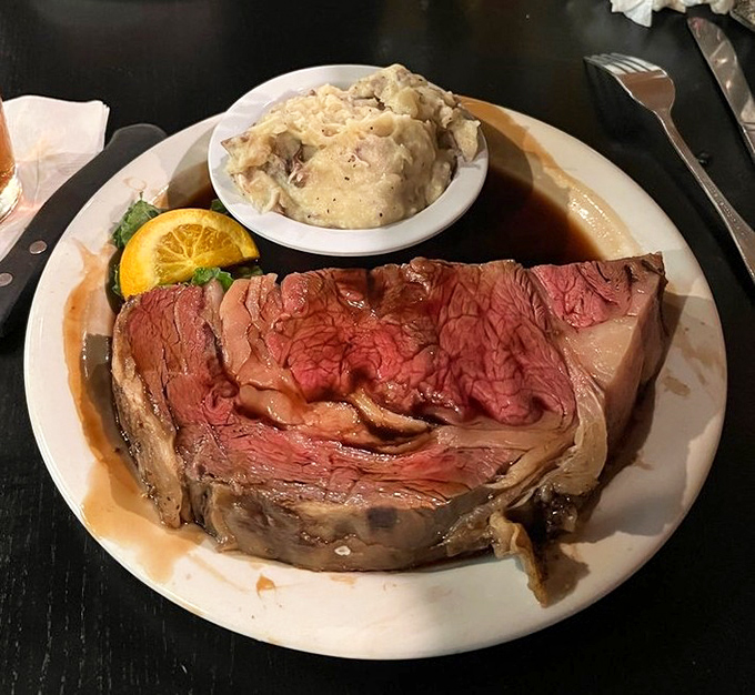 Behold the prime rib in all its glory&mdash;perfectly pink, impossibly tender, and served with a side of mashed potatoes that could make a grown adult weep with joy.