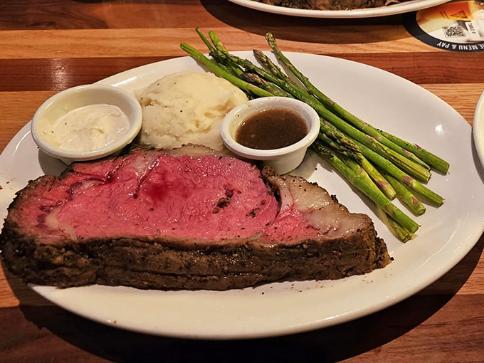 Behold the star of our show: prime rib so perfectly pink it makes even the asparagus jealous. That au jus? Liquid gold.