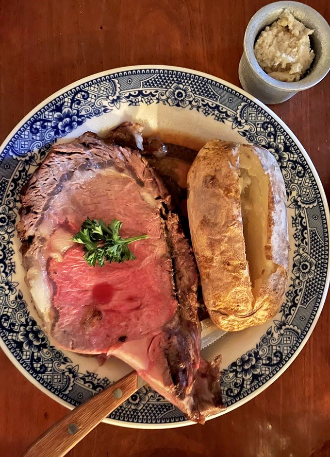 The legendary prime rib in all its glory &ndash; perfectly pink, impossibly tender, and served on blue willow china that your grandmother would fight you for.