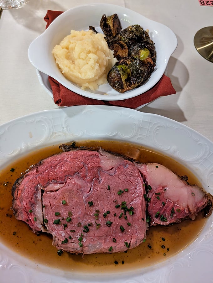 Prime rib perfection: perfectly pink, swimming in savory jus, with mashed potatoes standing by for gravy-soaking duty. This is beef's highest calling.