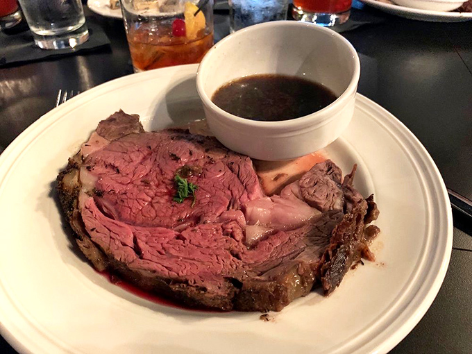 Behold the star of the show: prime rib so perfectly cooked it practically poses for its glamour shot. That au jus is basically liquid gold.