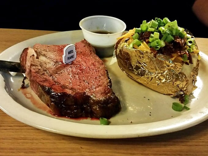 The star of the show: prime rib so perfectly pink it could make a vegetarian question their life choices. That loaded baked potato isn't just a sidekick.