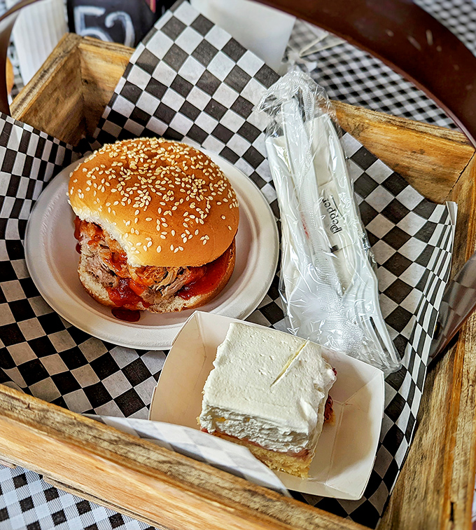 The star of the show arrives! This BBQ pulled pork sandwich on a sesame seed bun isn't just lunch&mdash;it's the reason people drive across counties.