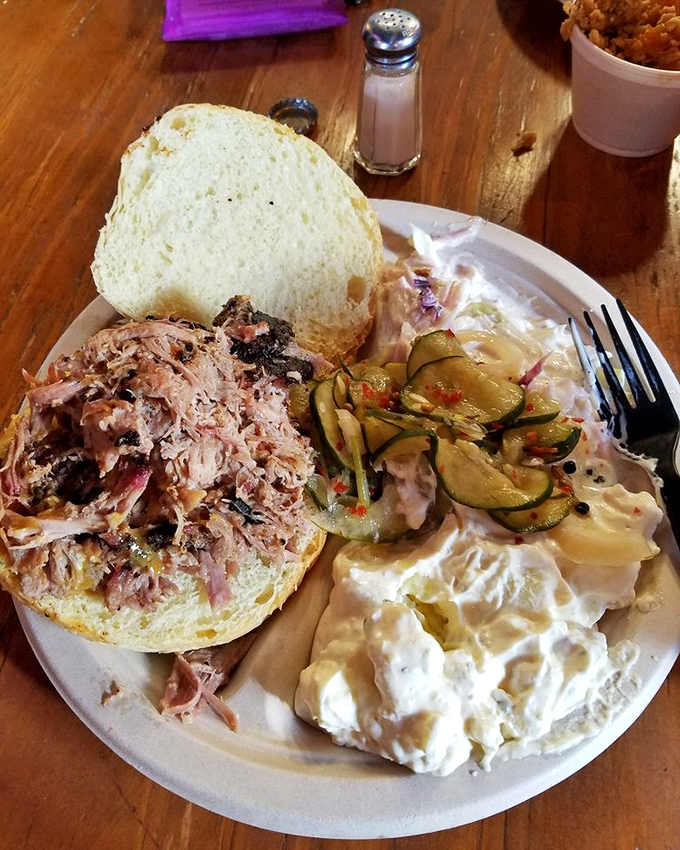 This pulled pork sandwich isn't just a meal&mdash;it's an event. That heap of smoky, tender pork practically begs you to unhinge your jaw like a python.