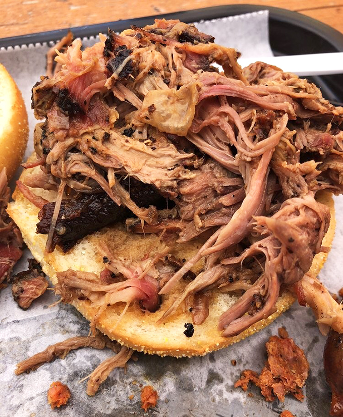 Pulled pork perfection on display. Those caramelized edges and tender strands are what barbecue dreams are made of.