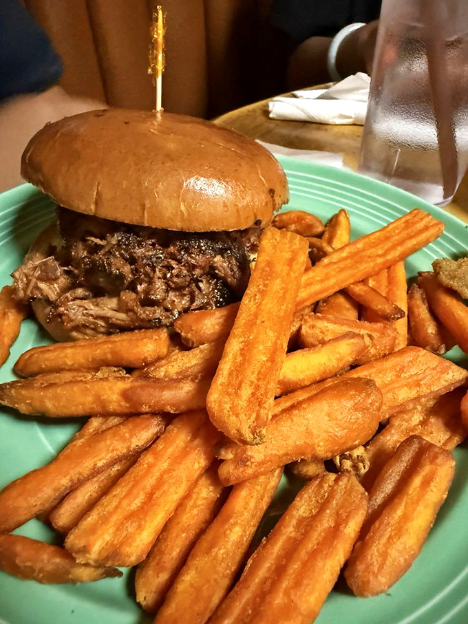 This pulled pork sandwich doesn't just satisfy hunger&mdash;it creates memories. Those golden fries could make a potato proud.