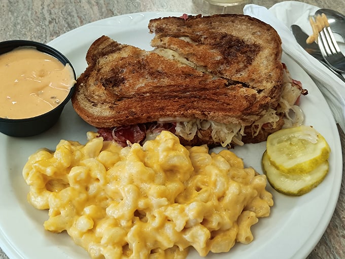 A proper Reuben doesn't need fancy presentation&mdash;just perfectly grilled bread, generous filling, and mac and cheese that would make your grandmother nod in approval.