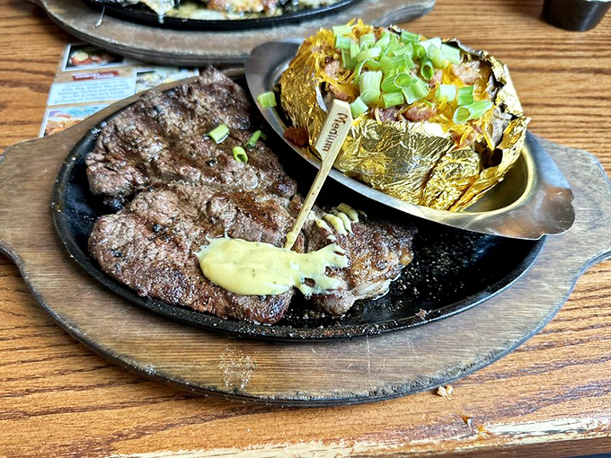 Behold the star of the show – a perfectly grilled ribeye with beautiful char marks that whisper, "Your diet starts tomorrow."