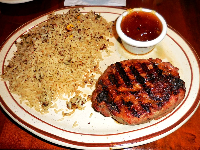 This isn't just a steak; it's a declaration of carnivorous intent. The perfect char outside, pink perfection inside, paired with rice that knows its supporting role.