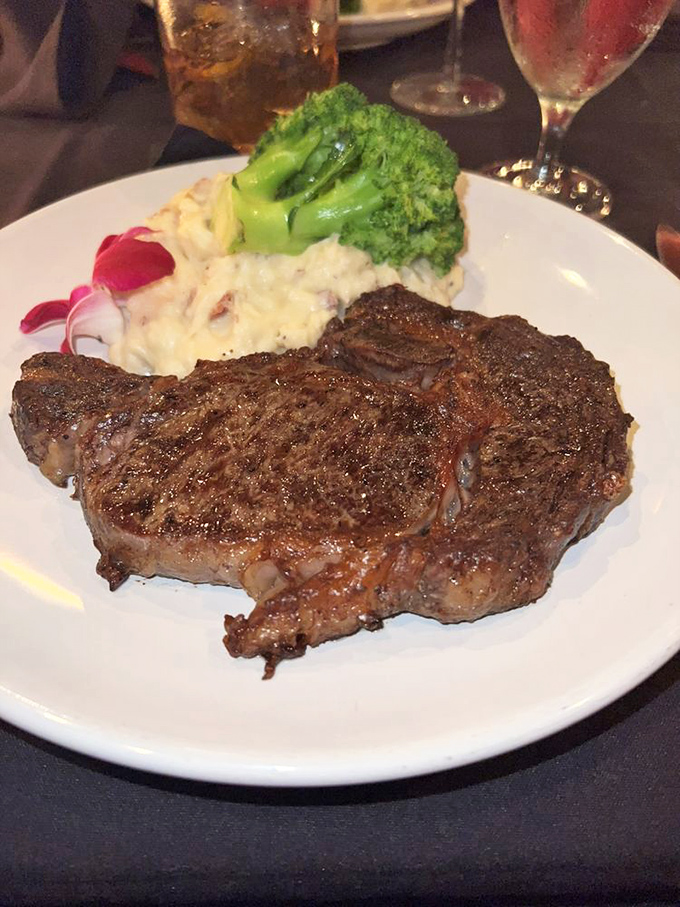 This isn't just any steak—it's the legendary ribeye that Virginians drive hours to experience, perfectly paired with garlic mashed potatoes and vibrant broccoli.