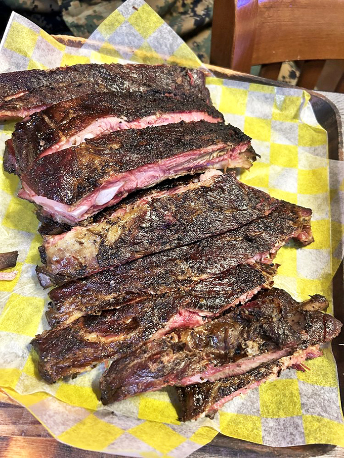 Behold the ribs&mdash;their bark so perfect it should be in a museum. That pink smoke ring is nature's way of saying "you're welcome."