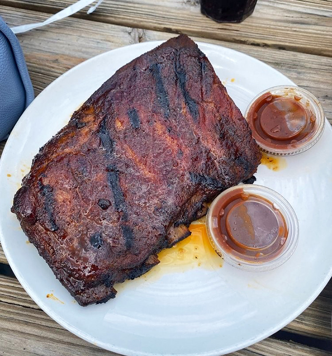 Behold the bark on these ribs&mdash;a smoky, caramelized masterpiece that makes you wonder if you've been eating barbecue wrong your entire life.