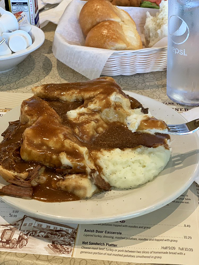 Behold the holy grail of heartland cuisine: fork-tender roast beef swimming in rich gravy alongside pillowy mashed potatoes. Diet plans, consider yourselves postponed.