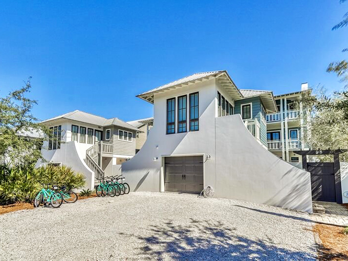 Modern meets coastal in this striking white residence, where bicycles parked outside hint at the town's preferred mode of transportation.h modern home