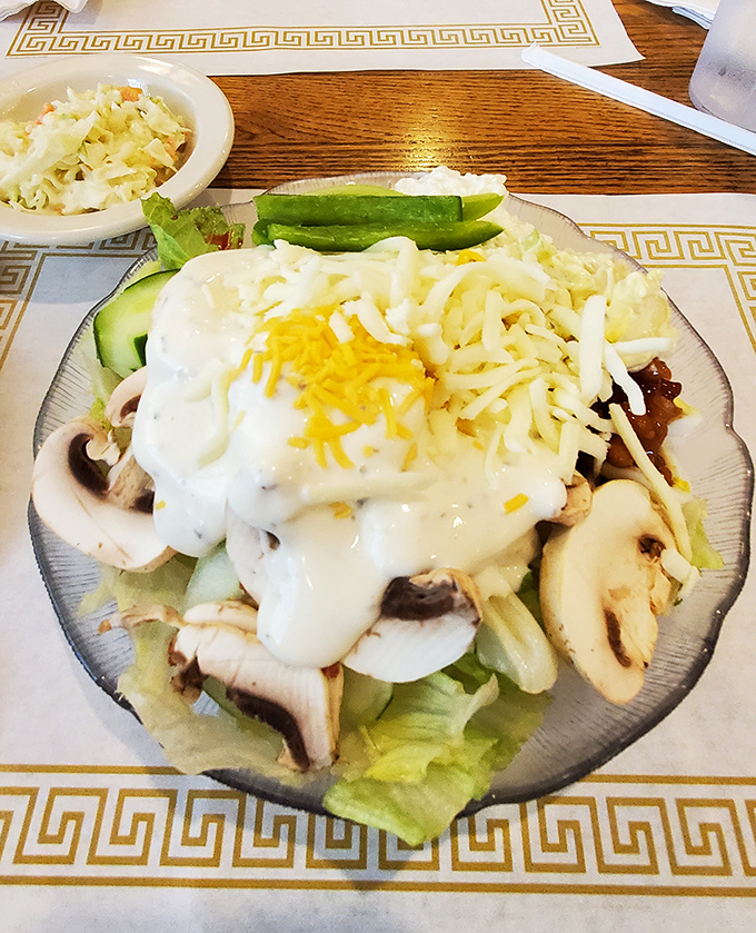 Garden-fresh ingredients transformed into a masterpiece of mushrooms, cheese, and creamy dressing. This isn't just a salad&mdash;it's edible architecture.