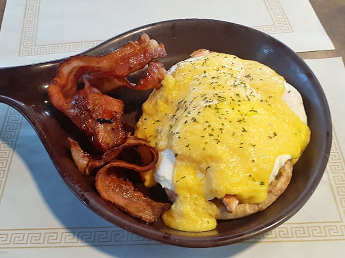 This Salmon Benedict isn't just breakfast, it's a morning masterpiece &ndash; hollandaise cascading over perfectly poached eggs like a sunrise over golden hills.