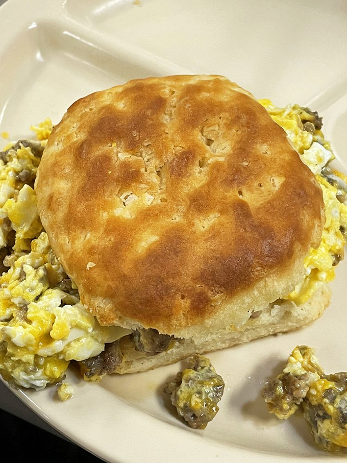 Breakfast sandwich nirvana! This fluffy biscuit barely contains the scrambled eggs and sausage that might just make you consider moving to Rocky Mount.