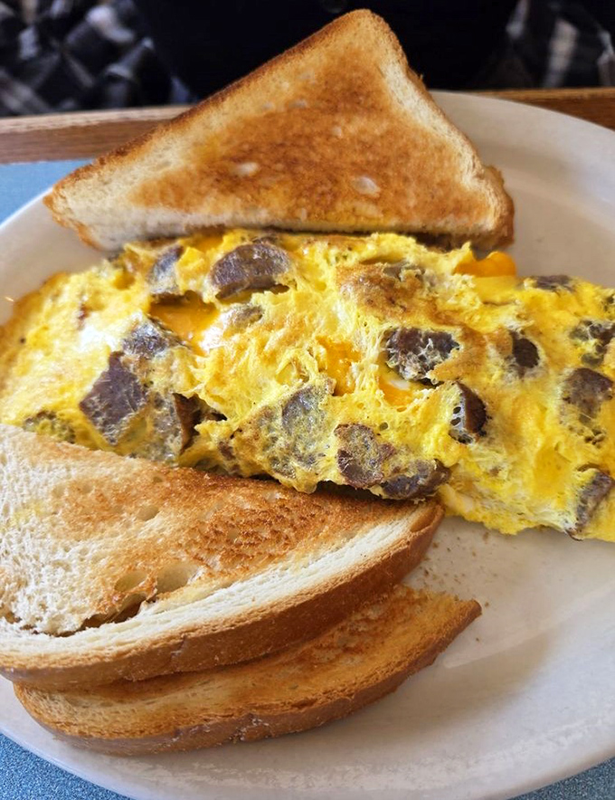Behold the mushroom omelet masterpiece &ndash; fluffy eggs embracing earthy fungi like old friends reuniting.