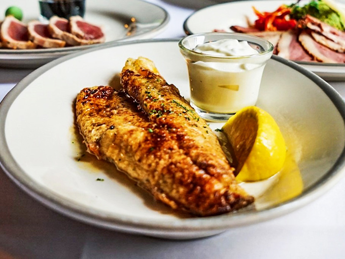 Golden-crusted perfection meets buttery tenderness. This walleye doesn't just swim to your plate &ndash; it practically dances there.