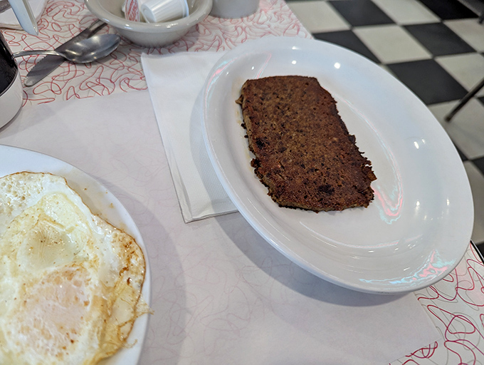 Behold Pennsylvania's misunderstood masterpiece&mdash;scrapple seared to golden perfection, a crispy exterior giving way to savory depths that transcend its humble origins.