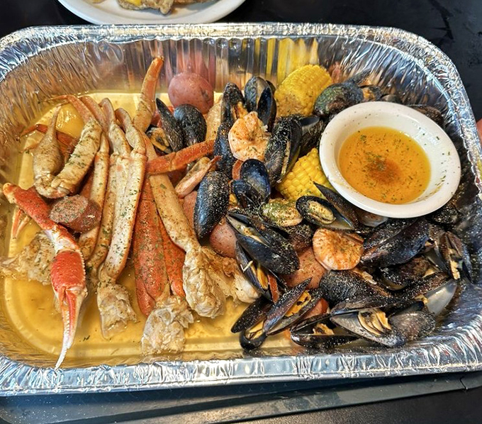 This seafood boil isn't messing around&mdash;crab legs, mussels, shrimp, and corn on the cob swimming in buttery broth that practically demands you wear the paper bib of honor.