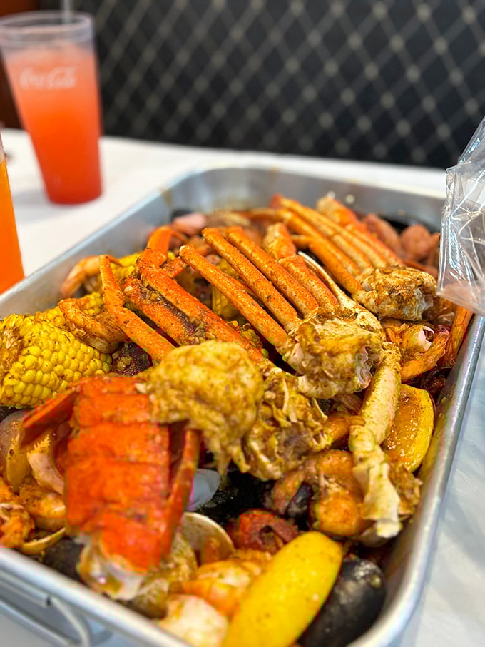 Seafood nirvana arrives in metal glory! Snow crab legs reaching skyward like they're making one last dramatic bid for freedom before meeting their delicious fate.