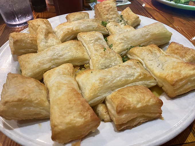 Flaky, golden pastry squares reveal what lies beneath&mdash;a seafood pot pie that doesn't just speak to your soul, it sings a full maritime opera.