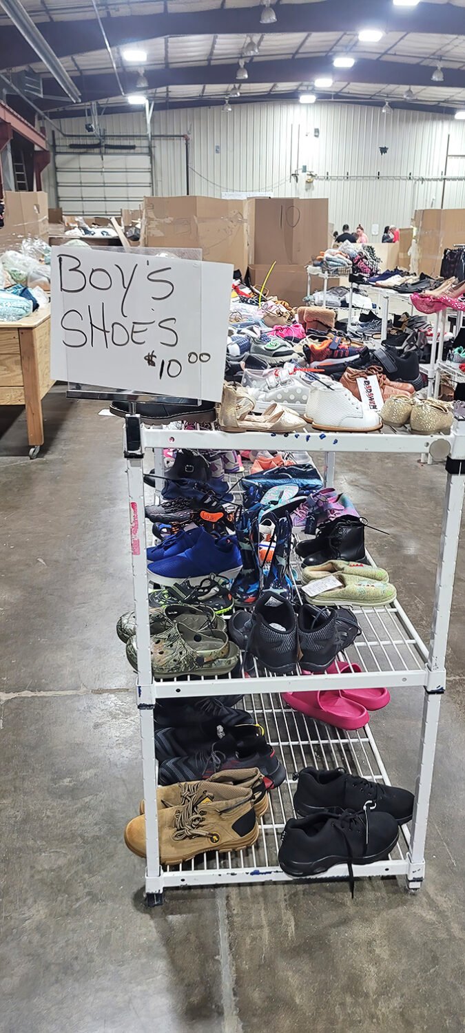 Shoe heaven for the budget-conscious! This rack of boys' footwear offers everything from rugged boots to sporty sneakers, all priced to make parents' wallets breathe easier.