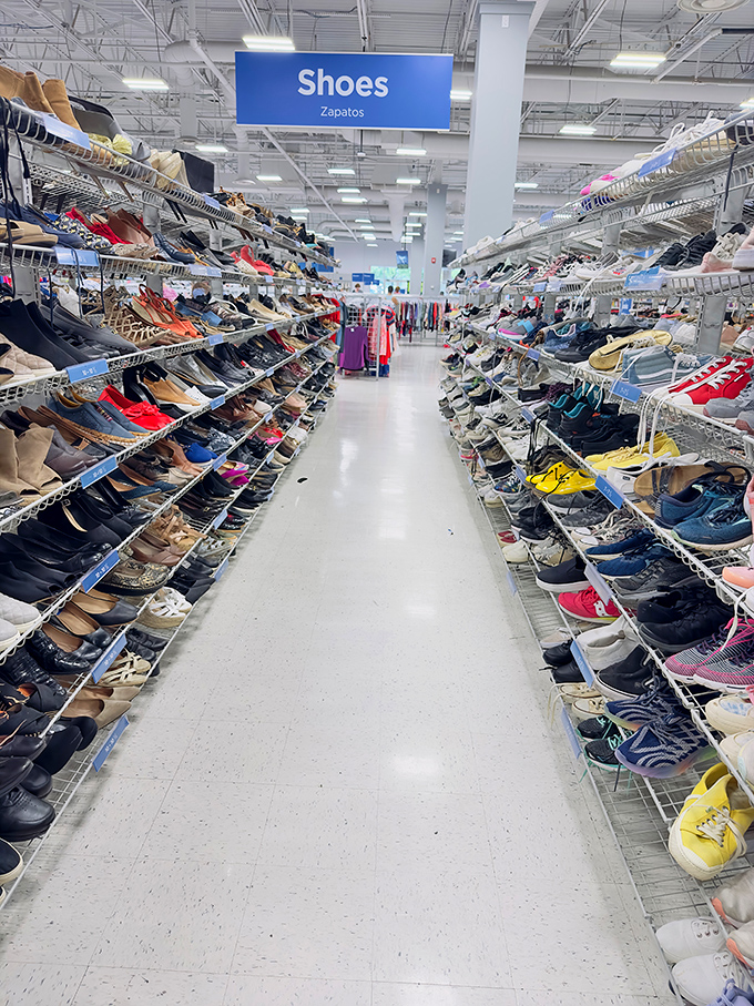 The shoe section stretches toward infinity like a scene from "The Matrix" where Neo discovers he can choose any footwear style, not just those weird boots.
