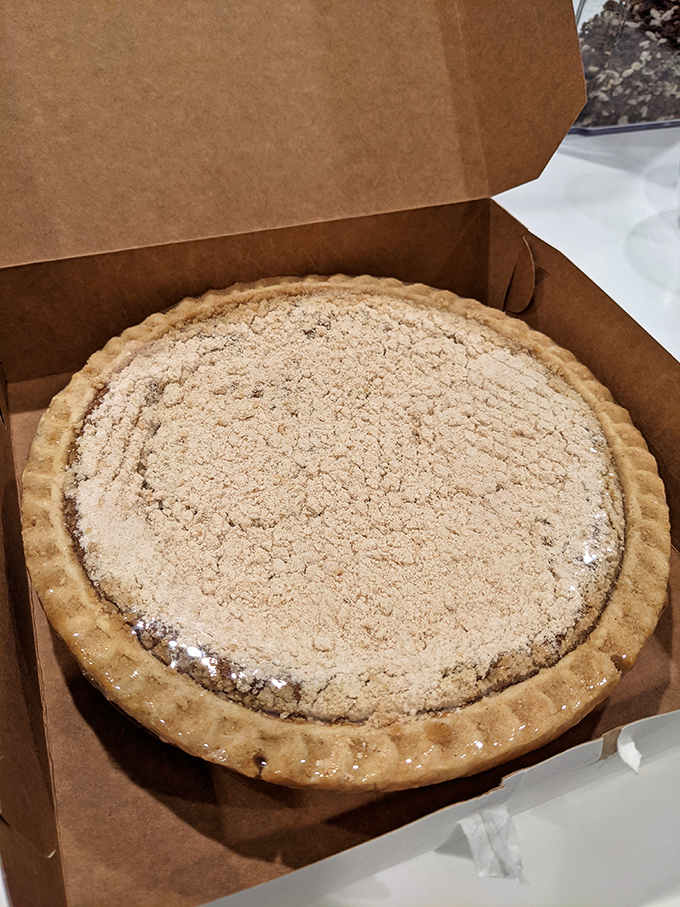 Behold the legendary shoo-fly pie in its natural habitat&mdash;a simple brown box that contains more happiness than most luxury purchases.