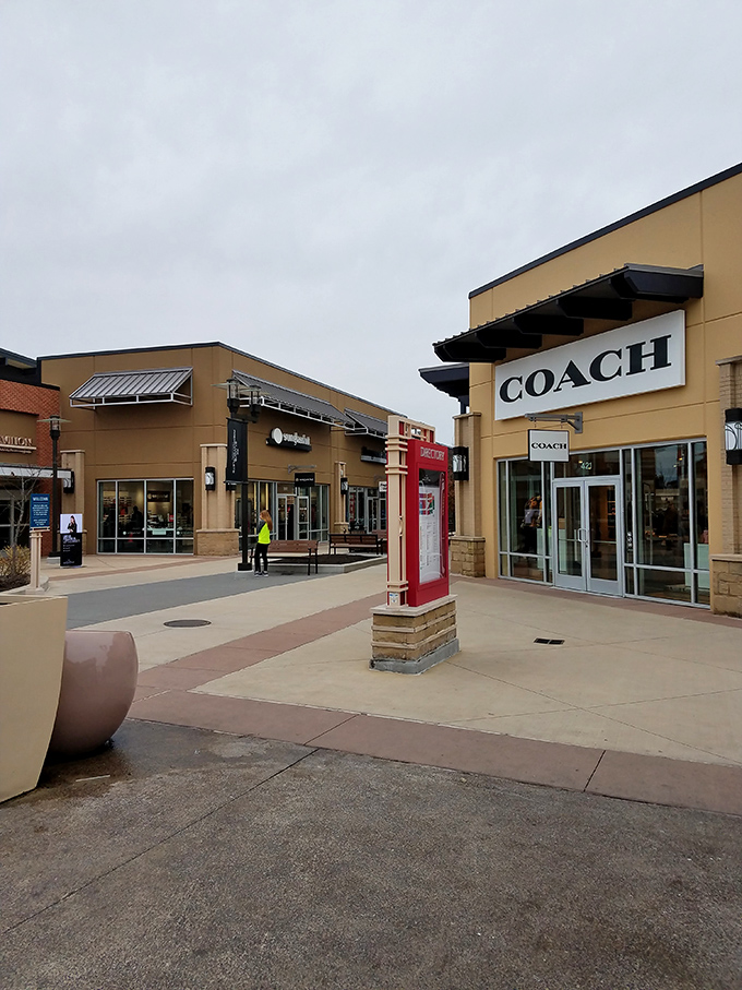 Coach corner beckons with the siren song of luxury at less painful prices. That red phone booth isn't for emergencies&mdash;unless running out of shopping bags counts.