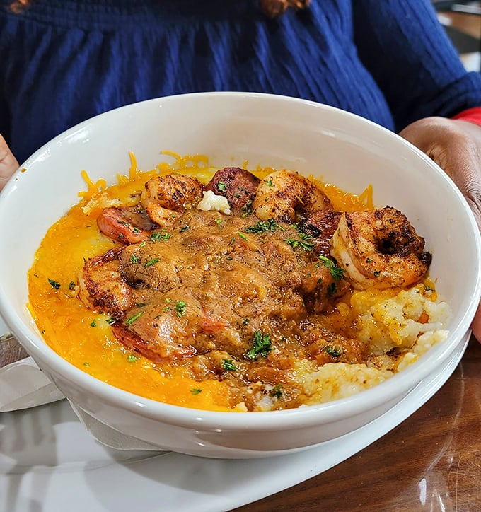 Behold the holy grail of Southern cuisine: shrimp and grits that make time stand still while your taste buds throw a party.