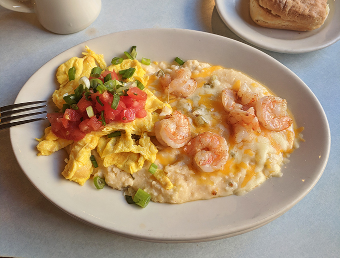 Behold the legendary shrimp and grits&mdash;creamy, cheesy goodness topped with plump shrimp and scrambled eggs. This plate has launched a thousand return visits.
