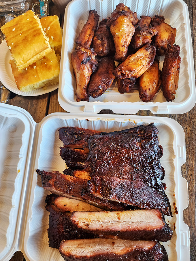 Hickory-smoked wings and ribs that would make a vegetarian question their life choices. The cornbread is just the supporting actor in this meaty drama.