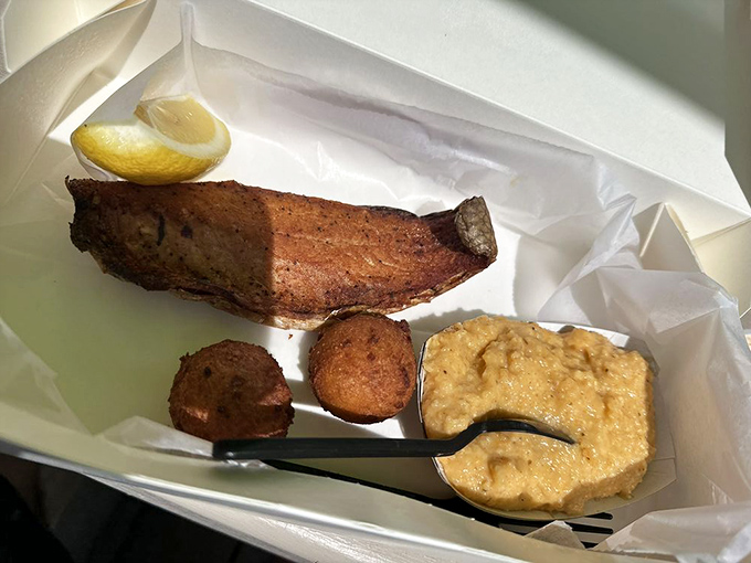 Smoked mullet with hush puppies—Florida's answer to fancy charcuterie boards. This is the appetizer that ruins all other appetizers forever.