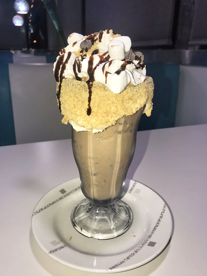 Not all heroes wear capes, but this s'mores shake definitely wears a crown of marshmallows. Dessert architecture at its finest.