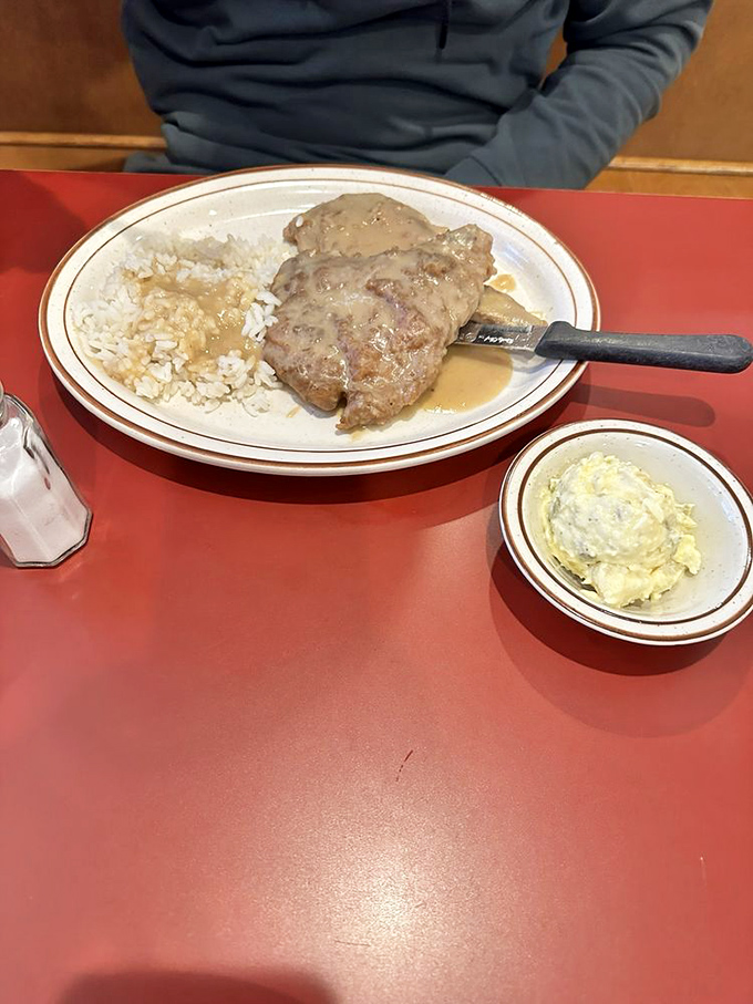 Golden-brown perfection smothered in rich gravy proves that some dishes were born to make you close your eyes and smile.