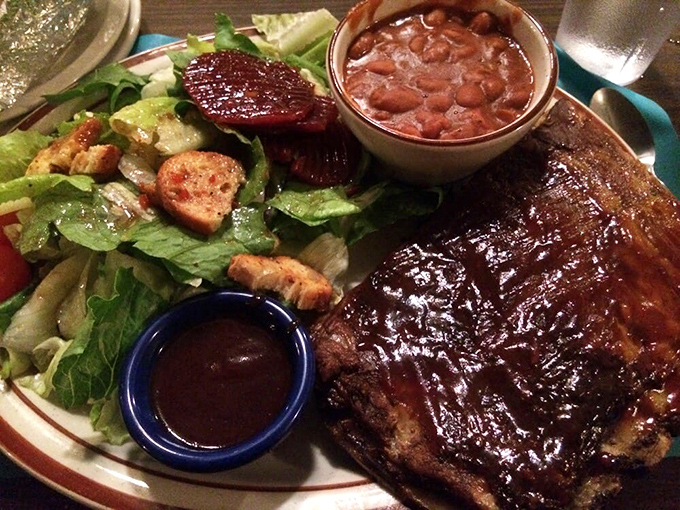 These St. Louis ribs aren't just falling off the bone&mdash;they're practically jumping onto your fork. Paired with that garden-fresh salad, it's carnivore heaven with a side of virtue.
