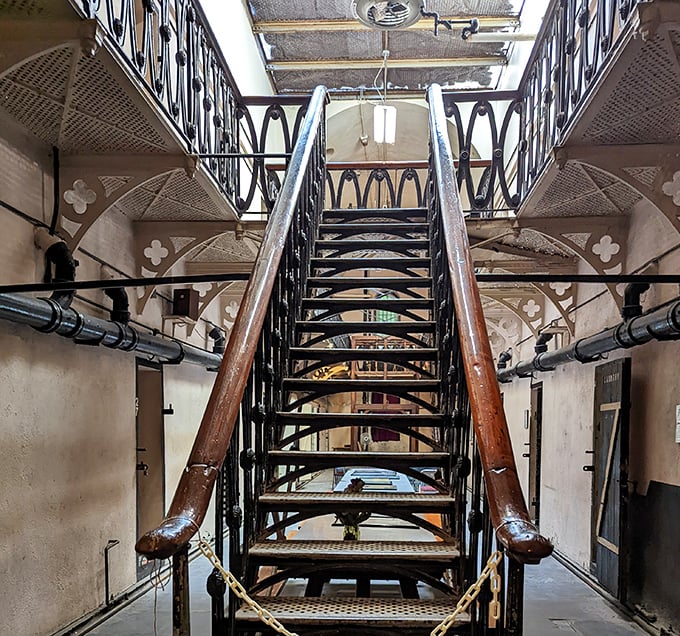 These iron stairs weren't designed for comfort&mdash;each step a reminder that the journey upward was just leading to more confinement.