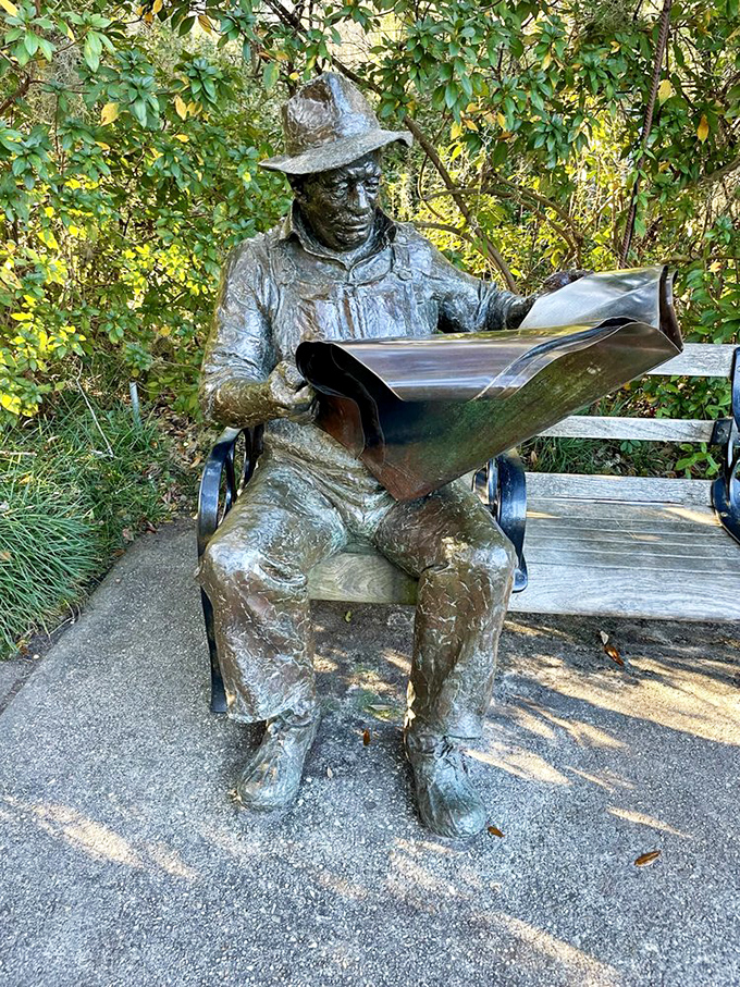 Lost in literary contemplation, this bronze reader reminds us that gardens aren't just for walking&mdash;they're perfect spots for getting lost in a good book.