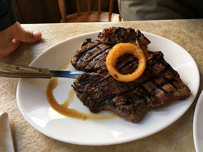 This steak isn't just cooked&mdash;it's been granted its final wish to be remembered as something spectacular. That onion ring crown is well-deserved.