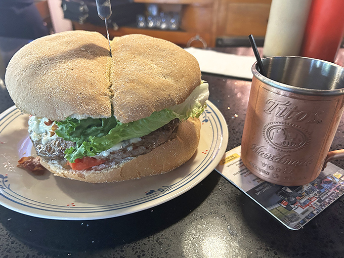 This isn't just a sandwich; it's edible architecture&mdash;a perfect balance of tender beef, fresh toppings, and a bun that knows its supporting role in this delicious drama. 