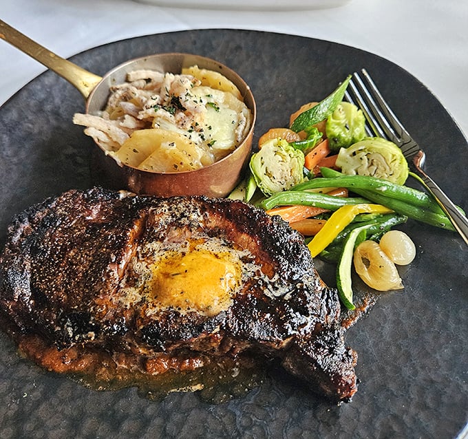 A steak that demands reverence &ndash; perfectly charred exterior giving way to a juicy interior, with sides that aren't merely afterthoughts but worthy companions.