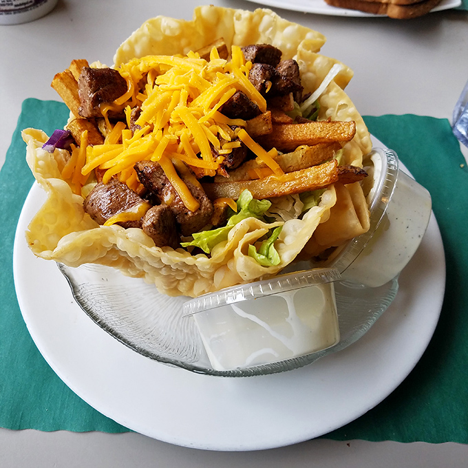 This isn't just a taco salad—it's an edible fortress of flavor. Crispy shell, seasoned steak, french fries, and cheese combine for Pennsylvania's answer to nacho nirvana.